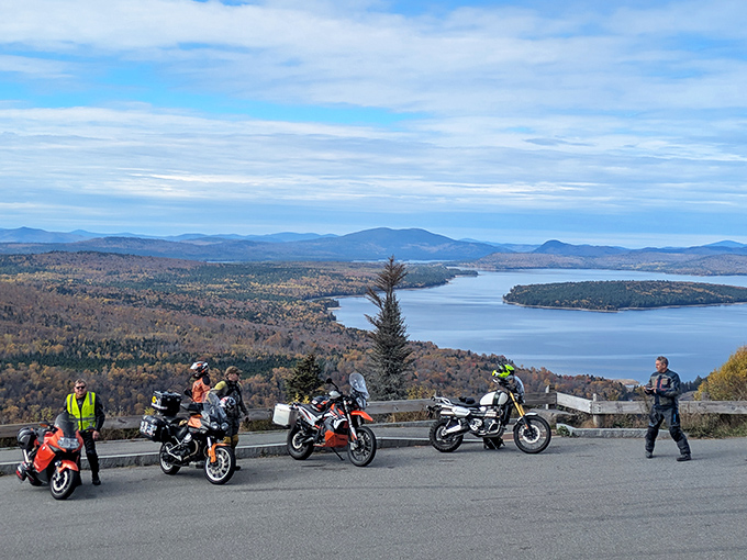 Motorcycle enthusiasts gather at nature's perfect pit stop, trading stories of winding roads while soaking in million-dollar views.