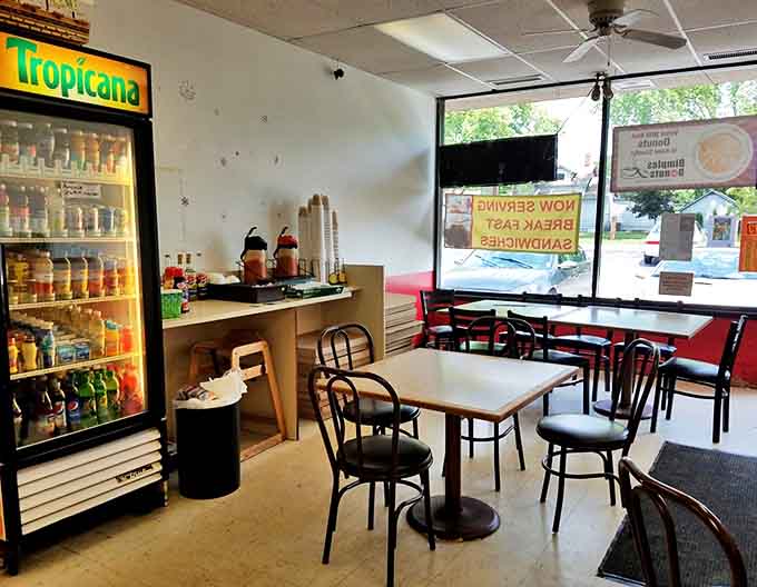 Simple tables, chairs, and a refrigerator stocked with drinks &ndash; everything you need for breakfast bliss without unnecessary frills.