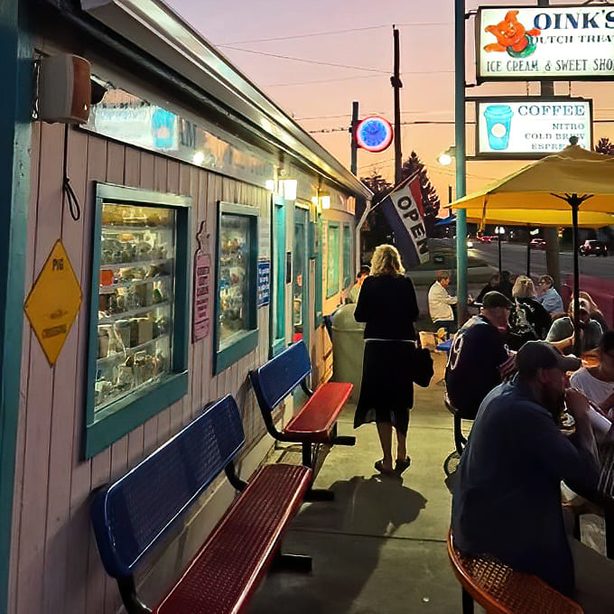 As dusk falls, Oink's glows like a lighthouse of lactose, guiding sweet-toothed sailors to safe harbor after a day at the beach.