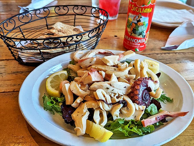 Octopus salad: Tender tentacles nestled among fresh greens create a seafood symphony that's both elegant and satisfying. The Mediterranean on a plate, no passport required.
