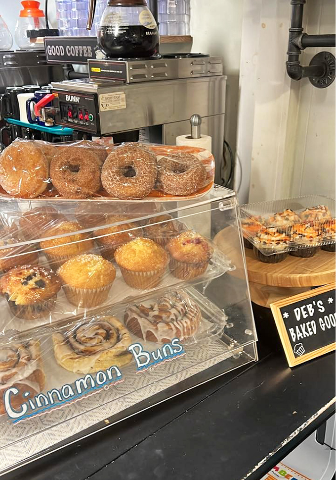 The bakery display case tempting you with cinnamon buns, donuts, and muffins, basically presenting a test of willpower that most people joyfully fail before 9 AM.