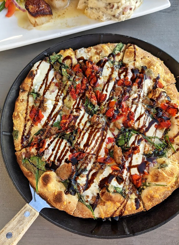 Pizza perfection that would make even a New Yorker nod in approval. It's a flavor fiesta on a crust, where every slice is a party invitation.