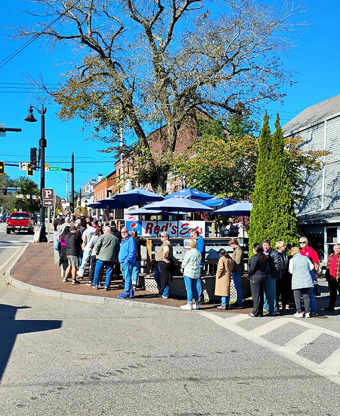 The line at Red's isn't just a wait – it's part of the experience, where anticipation builds and friendships form over shared food dreams.