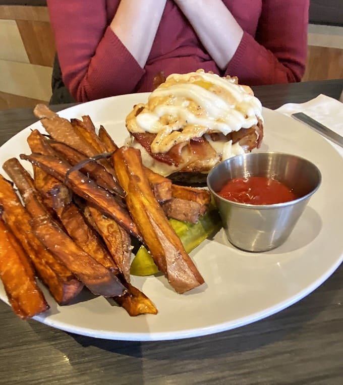 Sweet potato fries and a sandwich that required engineering to stack &ndash; comfort food that graduated with honors from culinary school.