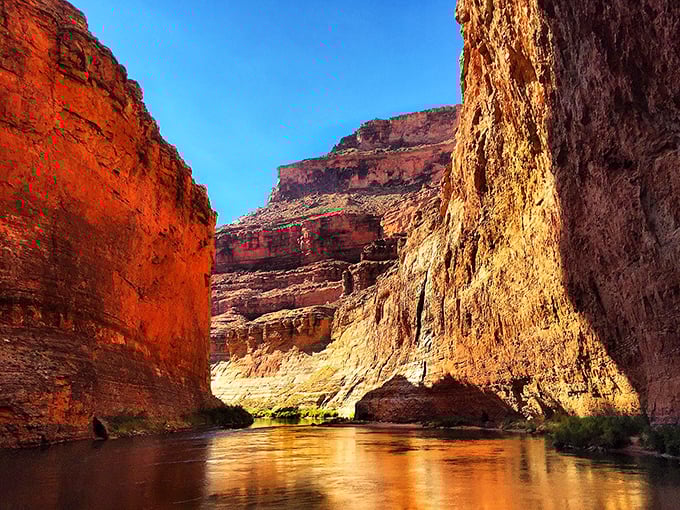 Floating dreamscapes! These rafts await their next adventure, bobbing gently against shores that have welcomed explorers since Powell's day.