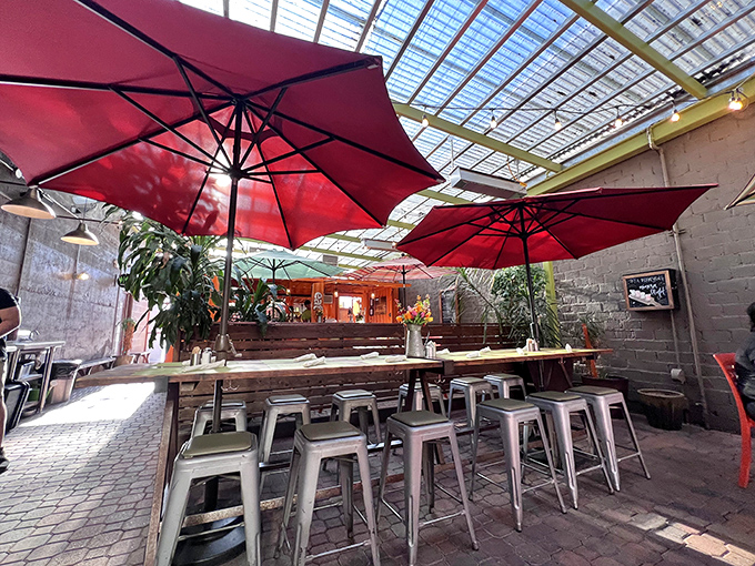 Bright pops of lime green energize the dining space, while the wooden clock serves as both timepiece and artistic focal point.