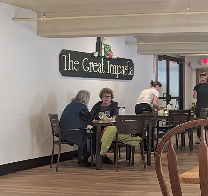 Minimalist d&eacute;cor and warm lighting create a comfortable setting where conversations flow as easily as the wine.