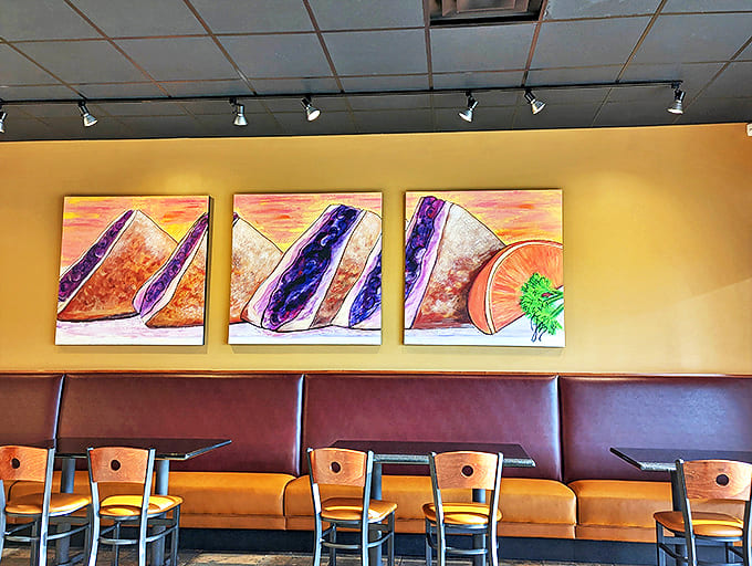 The seating arrangement offers that perfect blend of privacy and openness, where every table feels like the best seat in the house.