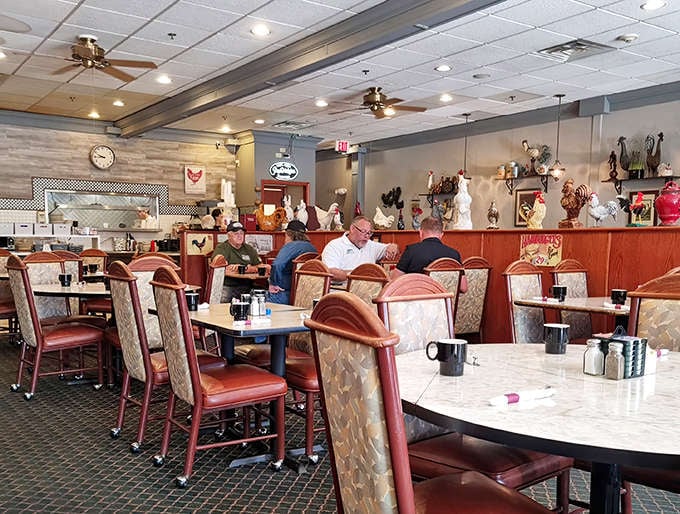Cozy seating areas with retro flooring create a nostalgic atmosphere that feels like visiting your favorite aunt's house for dinner.