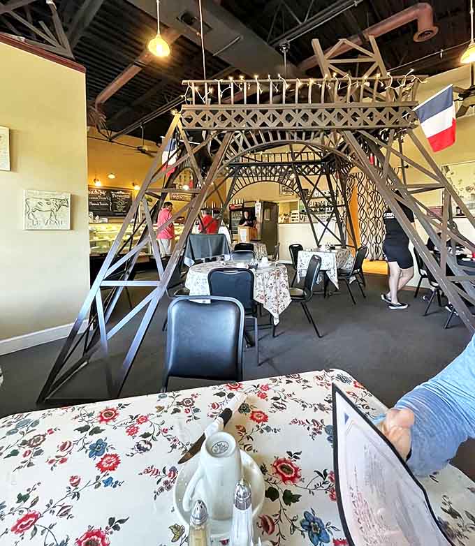Dining beneath the Eiffel Tower replica feels magical, with string lights creating an atmosphere that's both romantic and whimsical.