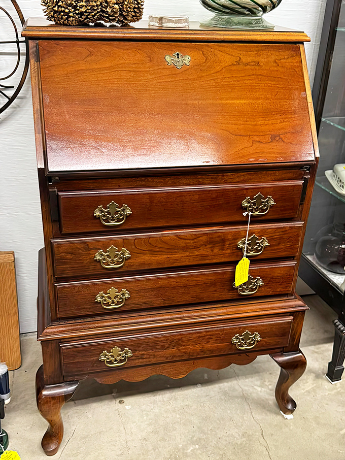 This secretary desk has probably seen more secrets than a small-town hairdresser. Those Queen Anne legs have stories to tell!