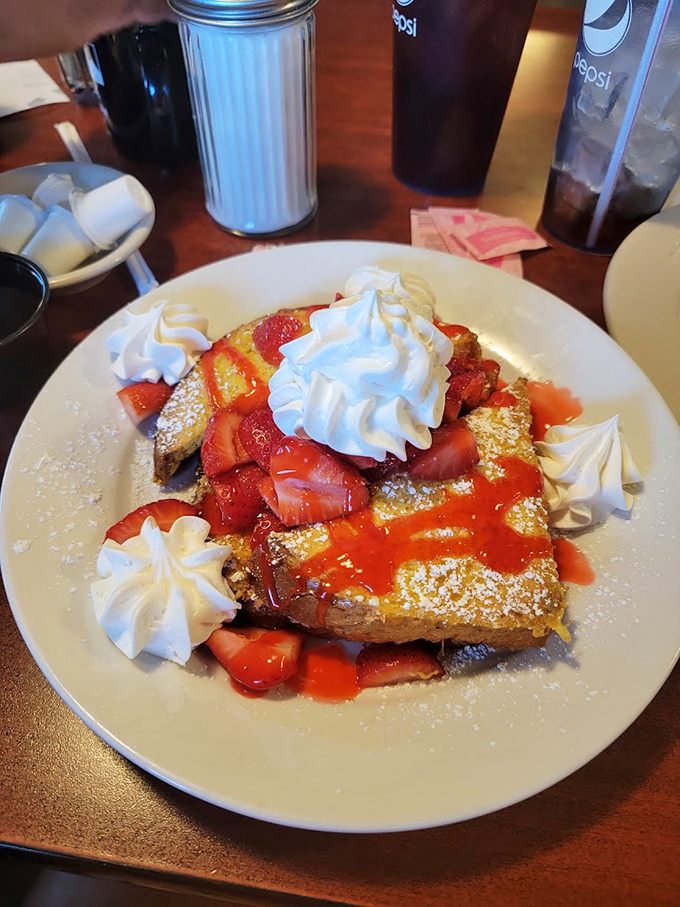 Berry-licious! This French toast creation is so pretty, it could moonlight as modern art... if it lasted long enough!