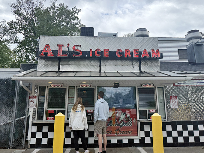 Al's cheerful takeout window has been serving up quick, friendly bites and burger happiness to visitors for years.