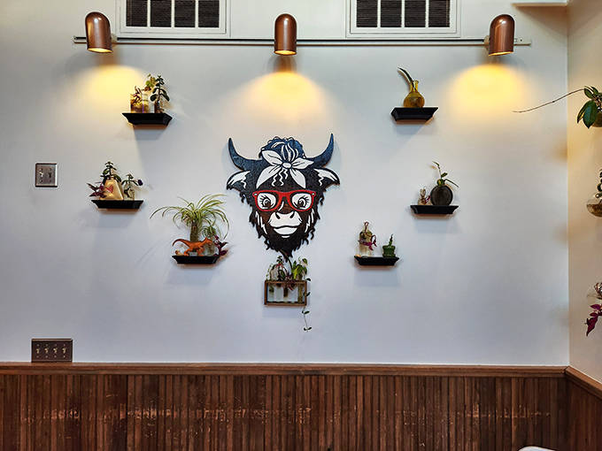 The restaurant's mascot &ndash; a bespectacled heifer with attitude &ndash; watches over diners from its place of honor on the wall.