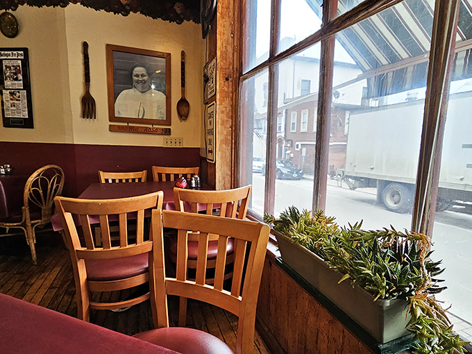 Window-side tables offer a cozy spot to watch the world go by while you contemplate whether you have room for just one more bite.
