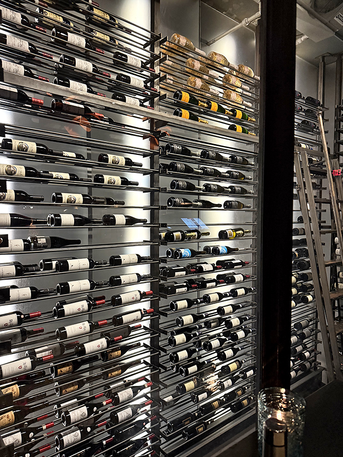 A temperature-controlled wine display showcases an impressive collection that would make any oenophile's heart skip a beat.