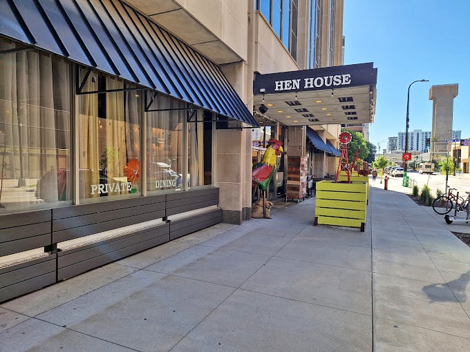 Urban energy meets down-home delights! Hen House's vibrant exterior promises pancakes that will power you through any adventure.