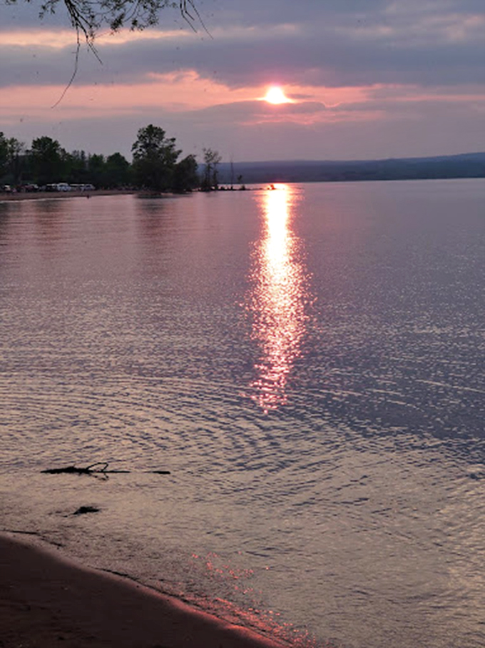 Crystal-clear waters stretch to the horizon, inviting you to dive into Lake Superior's refreshing embrace.