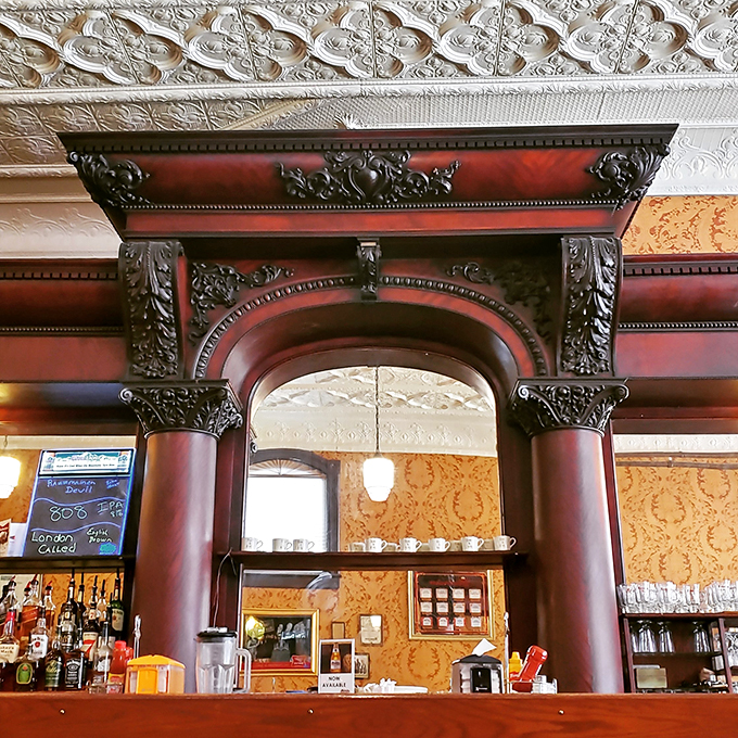Arch you glad you came? This ornate woodwork isn't just decor&mdash;it's a portal to a more elegant era. Mind your head, and your manners!