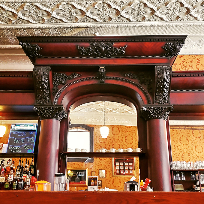 Arch you glad you came? This ornate woodwork isn't just decor&mdash;it's a portal to a more elegant era. Mind your head, and your manners!