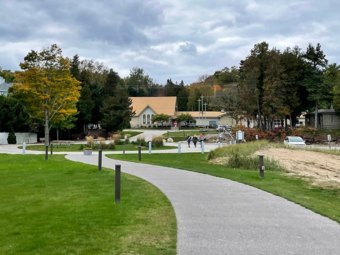 A winding pathway through manicured grounds invites exploration of Door County's charming small-town atmosphere.
