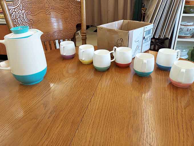 This two-tone ceramic set represents mid-century design philosophy at its best, where everyday objects were crafted to be both functional and beautiful.