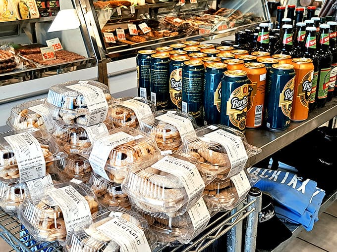 Sweet treats and savory breads await beside craft sodas. Because every great sandwich deserves worthy accompaniments.