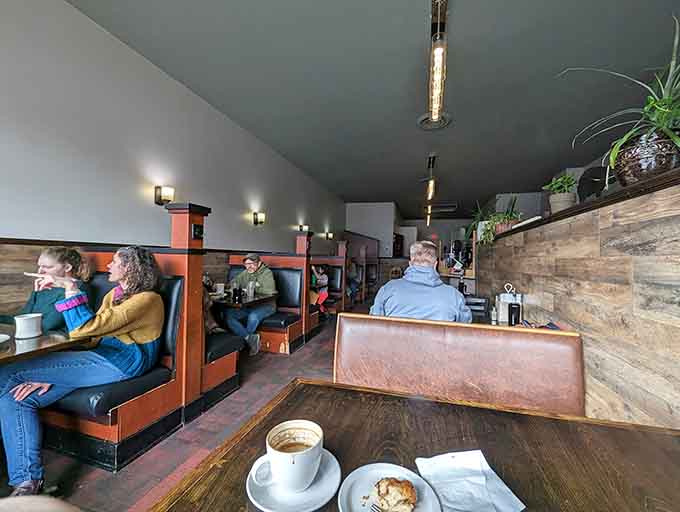 Happy diners enjoying their meals in cozy booths, living proof that Berry Sweet Kitchen has cracked the code on breakfast satisfaction.