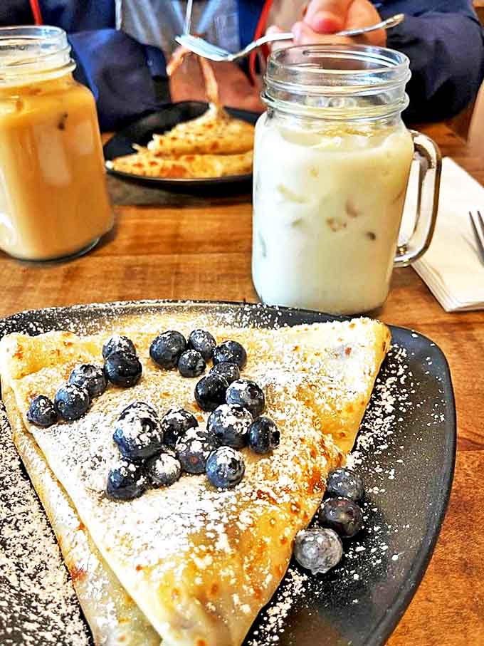 Blueberries and powdered sugar turn a simple crepe into a breakfast that feels fancy enough for a special occasion or lazy Sunday.