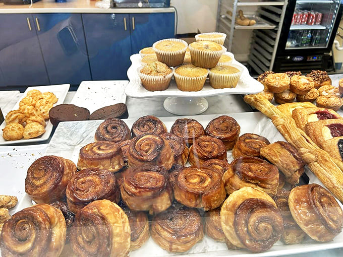 Cinnamon rolls spiraled to perfection, their centers promising that perfect gooey bite that makes Monday mornings bearable again.