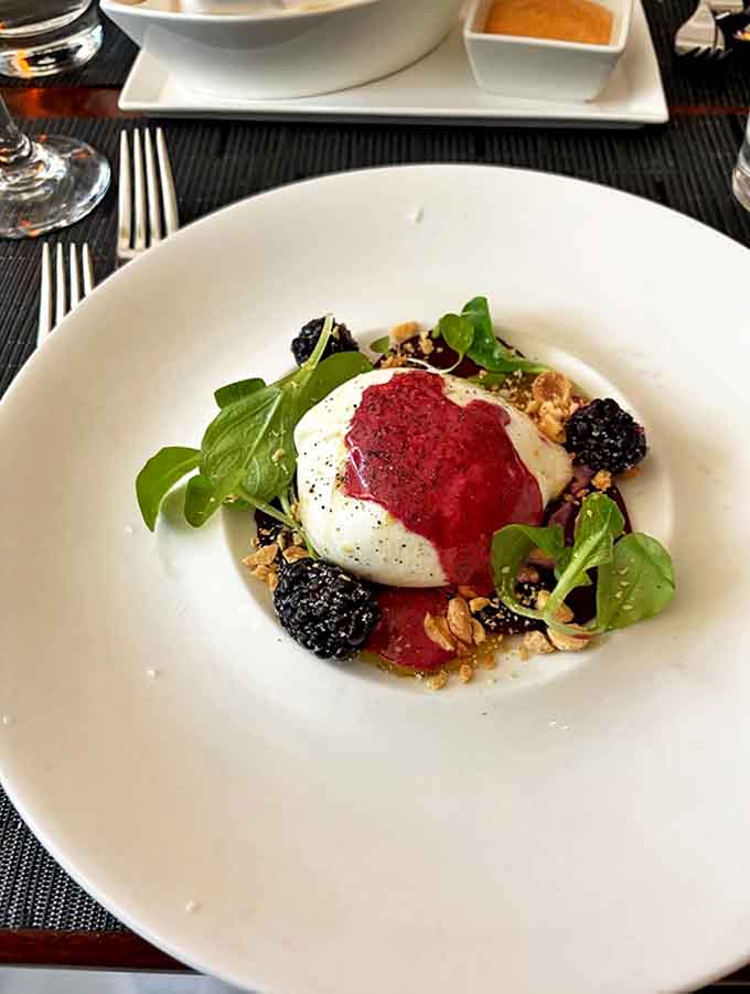Burrata that's living its best life among berries and greens &ndash; dairy decadence with a fresh, seasonal supporting cast.