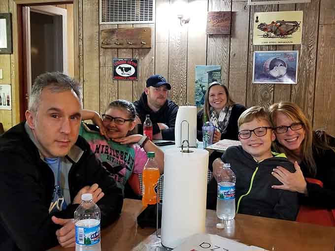 This is what happiness looks like: families gathered around picnic tables, sharing food and creating memories one slice at a time.