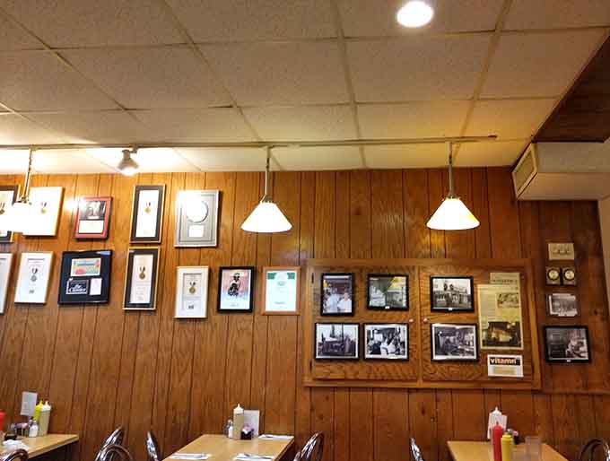 Walls adorned with framed photographs and memorabilia tell the story of decades serving this community with dedication and delicious food.