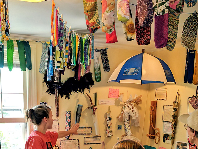 Look up! The rainbow of dangling covers transforms the ceiling into an art installation that Mary Poppins would surely approve of.