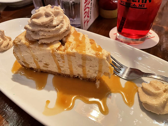 Cheesecake drizzled with caramel and crowned with whipped cream, the sweet finale that makes loosening your belt worthwhile.