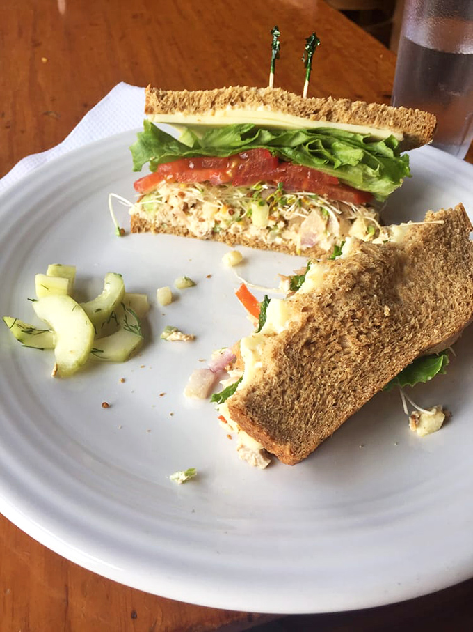 This chicken salad sandwich isn't just lunch &ndash; it's a perfect composition of textures and flavors, with those house-pickled cucumbers adding bright contrast.