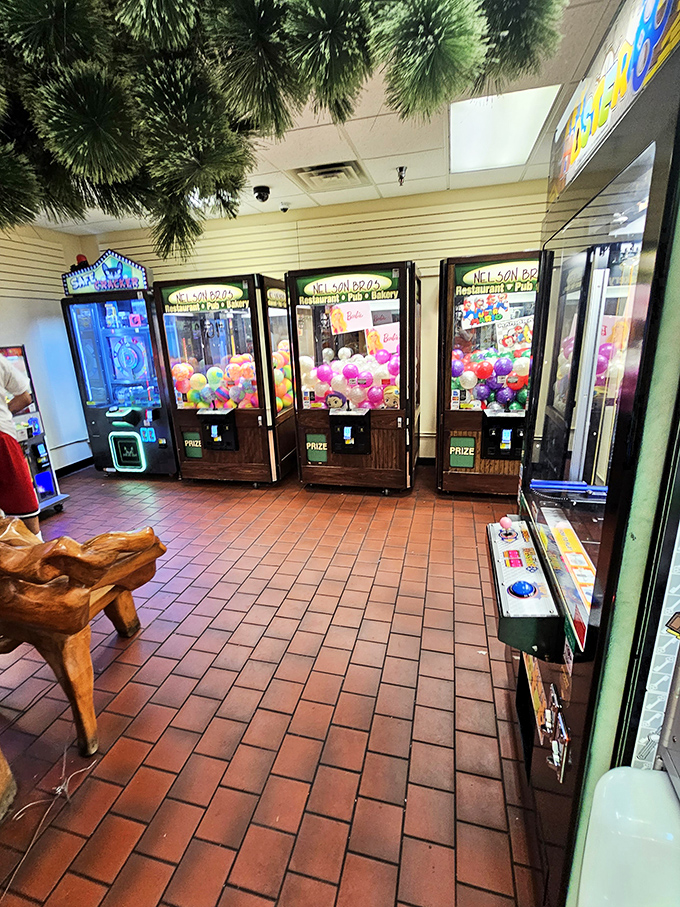 Colorful claw machines stand ready to entertain restless kids and nostalgic adults between bites of homemade pie.