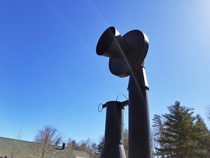 A close-up reveals the craftsmanship that went into creating this monument, with details that perfectly capture the essence of vintage telephone design.
