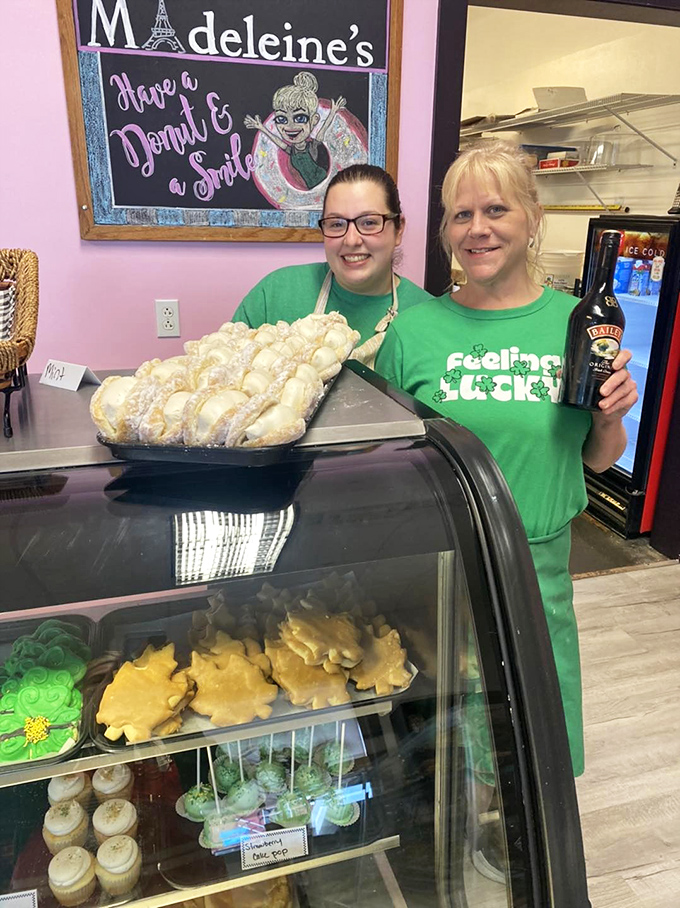 A festive moment at Madeleine's, where the staff's enthusiasm for their creations is as delightful as the treats themselves.