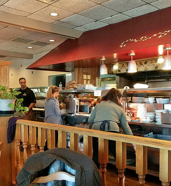 A peek into the kitchen shows the organized chaos where pancake magic happens, one golden stack at a time.