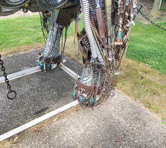 Even the feet showcase impressive engineering, with chains and metal pieces arranged to support this towering tribute to imagination.