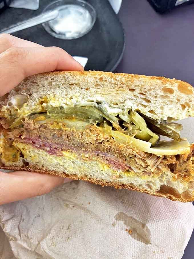 The Cuban Conundrum solves the eternal mystery of how to balance pork, pickles, and cheese in proportions that make taste buds stand at attention.