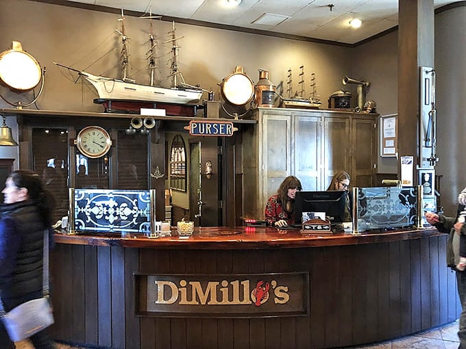 The front desk area sets the maritime tone immediately, decorated with nautical touches that feel authentic rather than theme-park-ish.