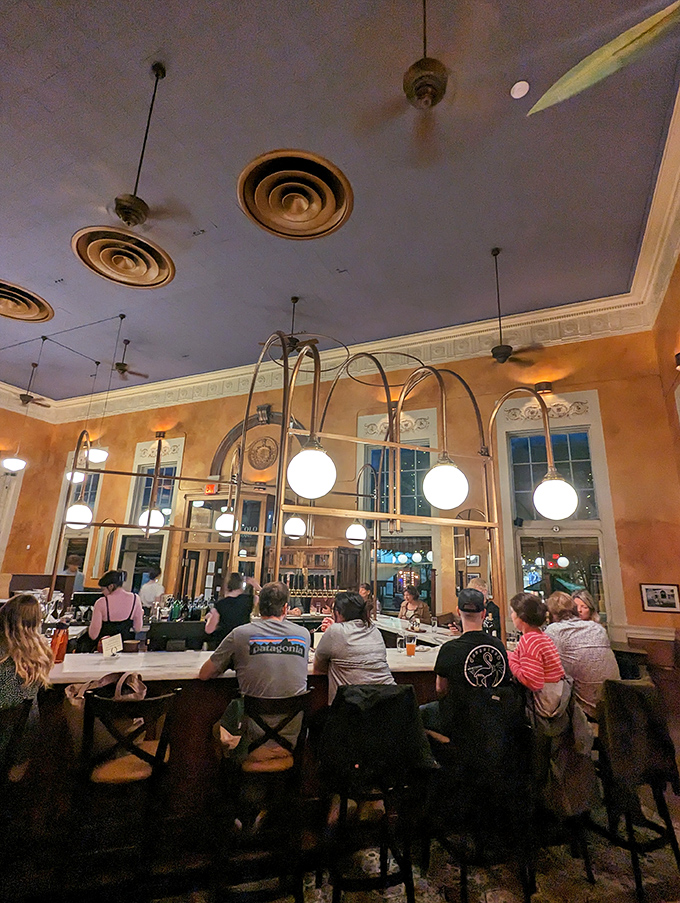 Diners: The bar area buzzes with energy as patrons gather for good food, great drinks, and the kind of conversations that matter.
