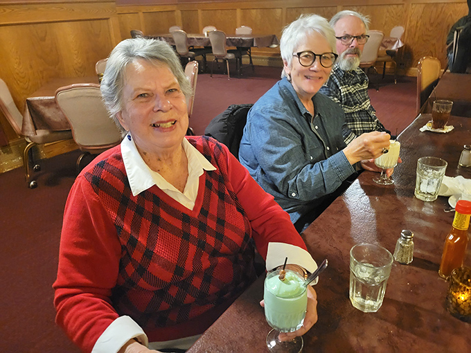 Patrons enjoying grasshopper cocktails &ndash; dessert you can sip while debating whether you have room for actual dessert.