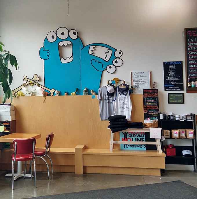 When a coffee shop sells its own merch, you know the cult following has reached official status and people are proud members.