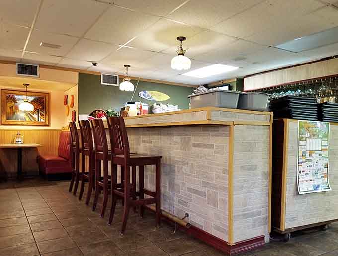Counter seating offers front-row views of the kitchen action for those who enjoy watching their meal come together.