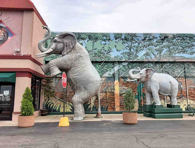 These majestic elephant statues stand guard outside Safari Land, setting the stage for the wild adventure waiting inside &ndash; silent sentinels of suburban fun.