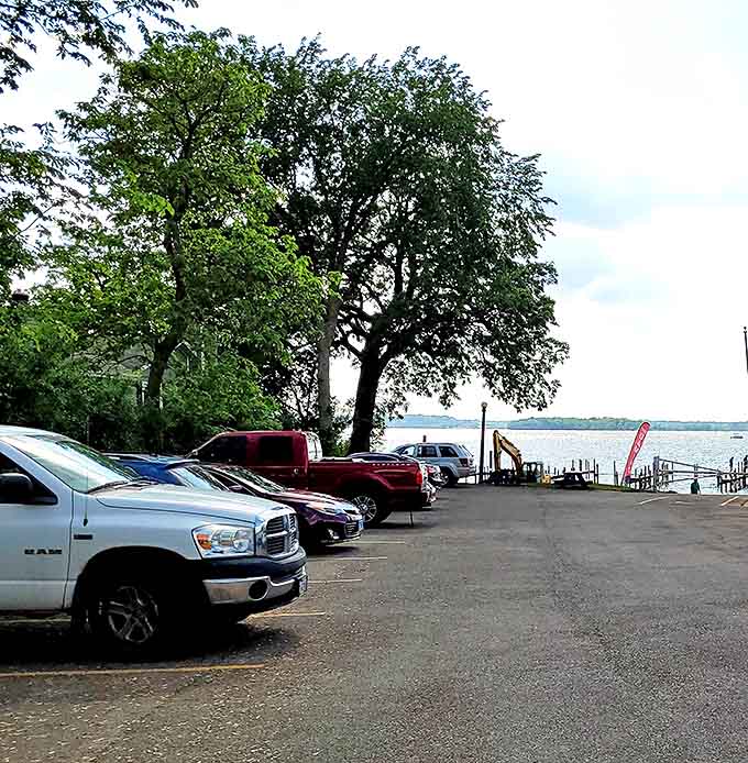 A parking lot with a view&mdash;where vehicles wait patiently while their owners indulge in lakeside pleasures just steps away.