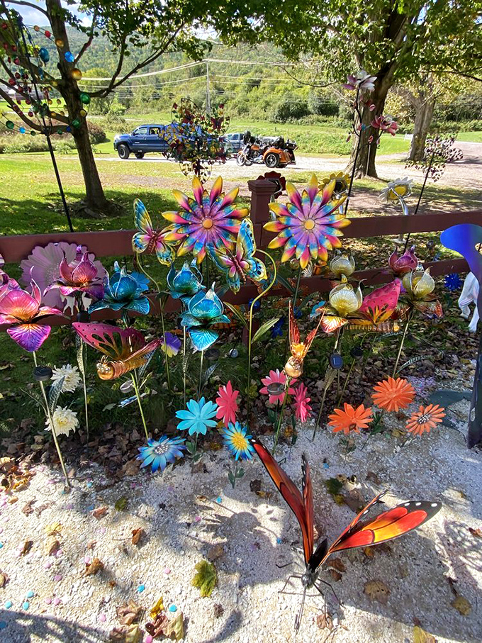 Garden of imagination! Metal flowers in rainbow hues bloom eternally alongside whimsical butterflies—bringing sustainable spring to every season.